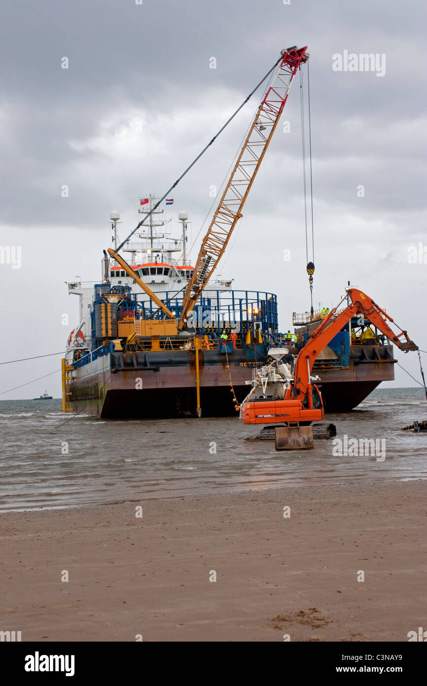 The cable ship Stemat Spirit begins to lay the electricity cable from ...