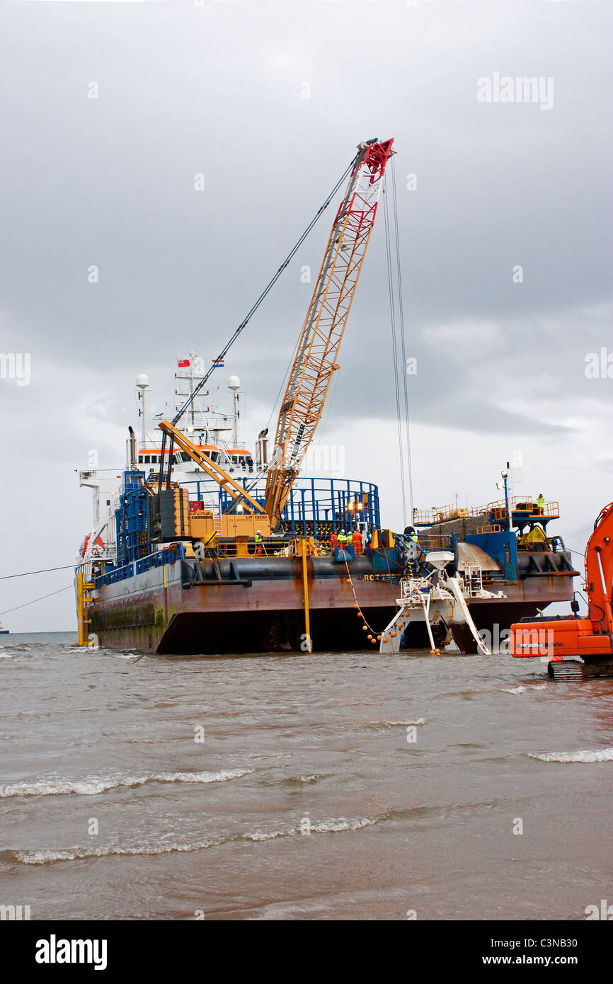 The cable ship Stemat Spirit begins to lay the electricity cable from ...