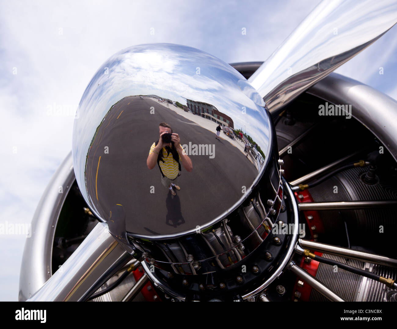 AT-6 Texan, known as the Harvard training plane engine with reflection ...
