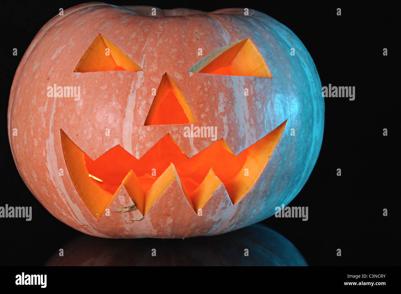 Lighting candle inside pumpkin hi-res stock photography and images - Alamy