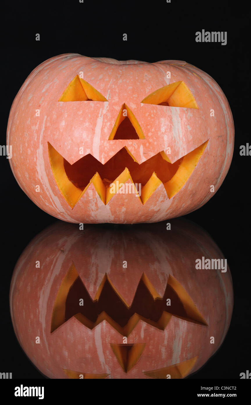 Lighting candle inside pumpkin hi-res stock photography and images - Alamy
