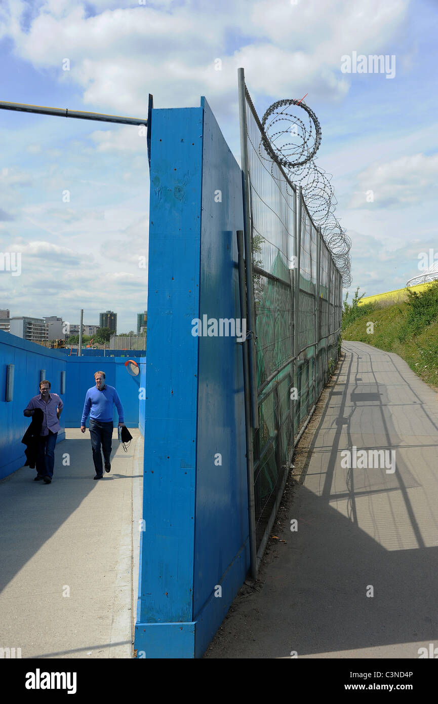Happy dad carries serious podgy cute son Stock Photo - Alamy