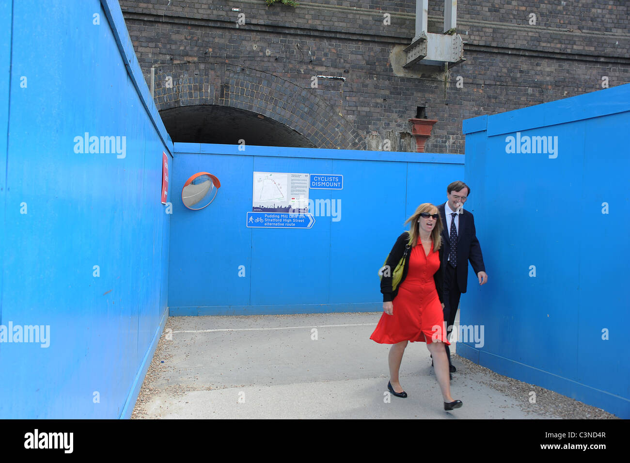 Happy dad carries serious podgy cute son Stock Photo - Alamy