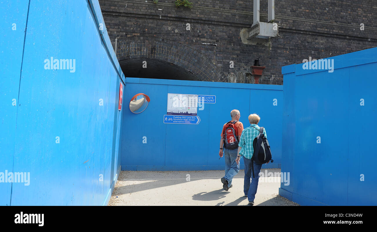 Happy dad carries serious podgy cute son Stock Photo - Alamy