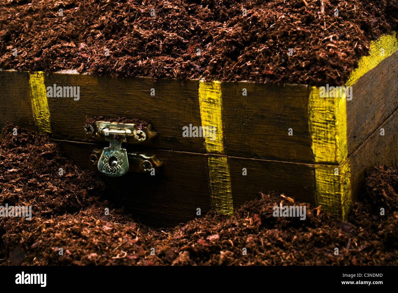 Closed chest box in dirt isolated over white Stock Photo - Alamy