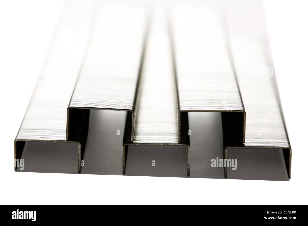 Five staples isolated over white Stock Photo - Alamy