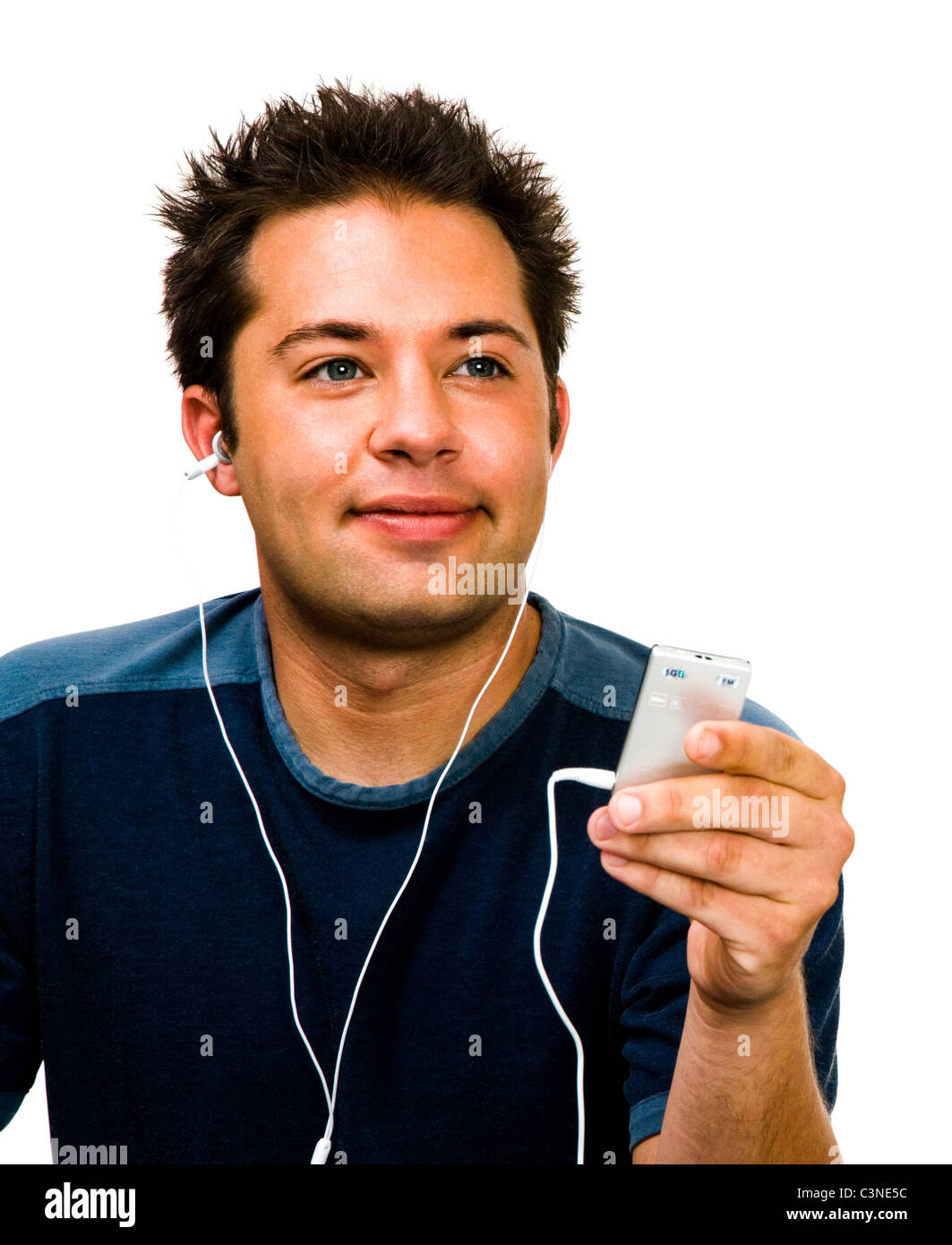Happy man listening to music on a MP3 player isolated over white Stock ...