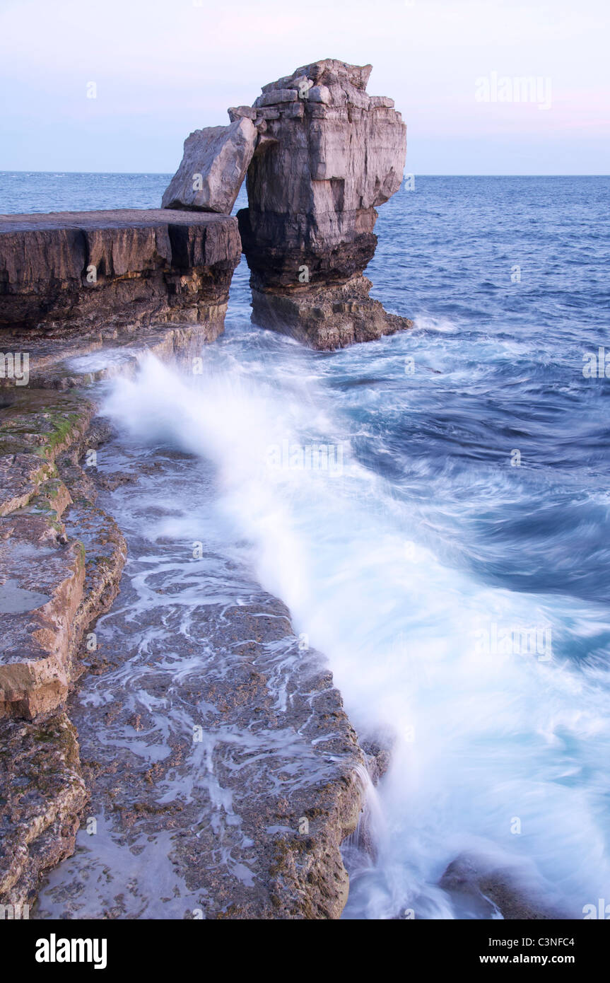 Pulpit Rock in a stormy sea. This massive limestone stack stands just ...