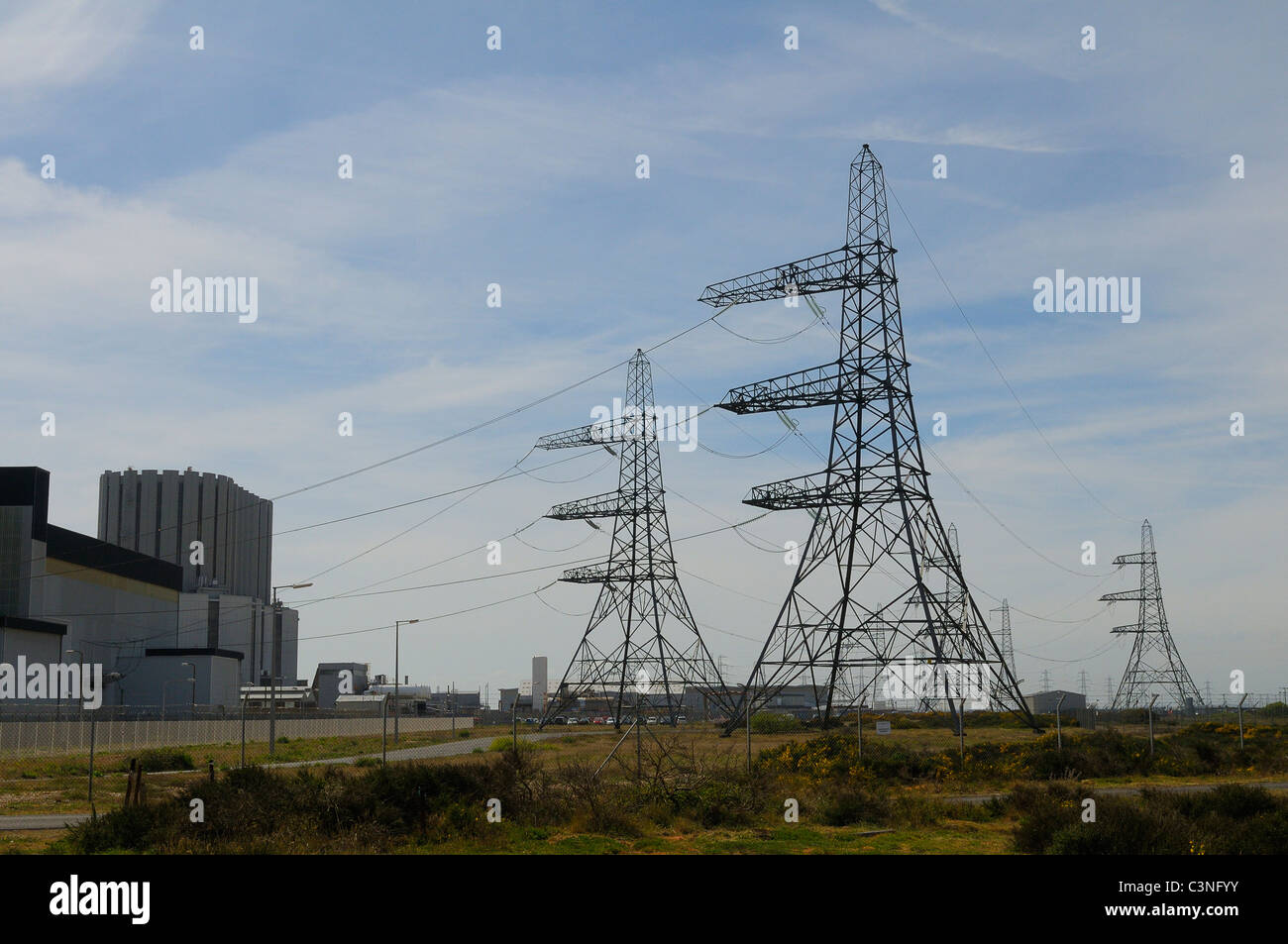 High tension power lines and pylons at Dungeness nuclear power station ...
