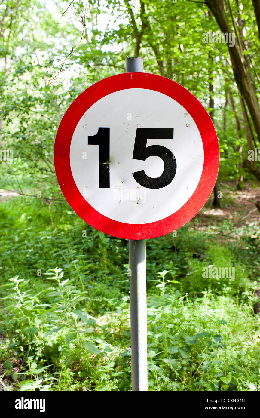 15 miles an hour speed road sign portrait with bullet holes Stock Photo ...