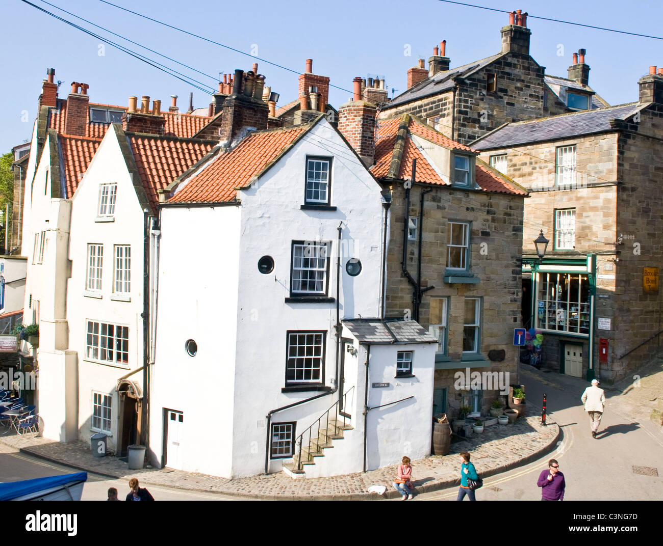 Curved street in coastal village of Robin Hoods Bay north Yorkshire ...