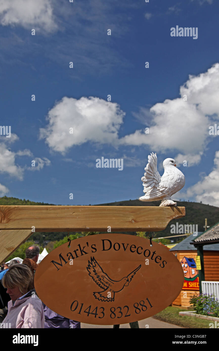 Hand-made dovecote stand with a plastic dove at the RHS Spring Show in ...