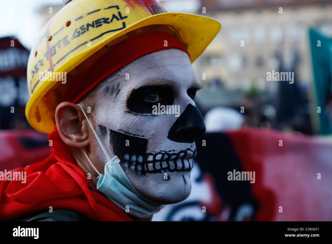 A demonstrator with scary skeleton makeup paint on his face takes part ...