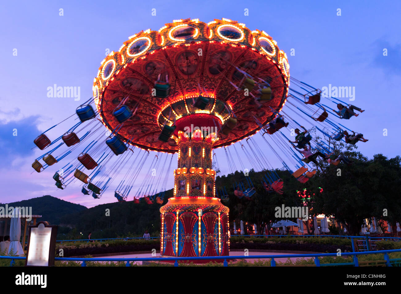 Merry go round park hi-res stock photography and images - Alamy