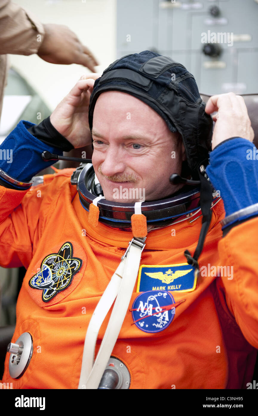 Space shuttle Endeavour's commander Mark Kelly in his launch suit at ...