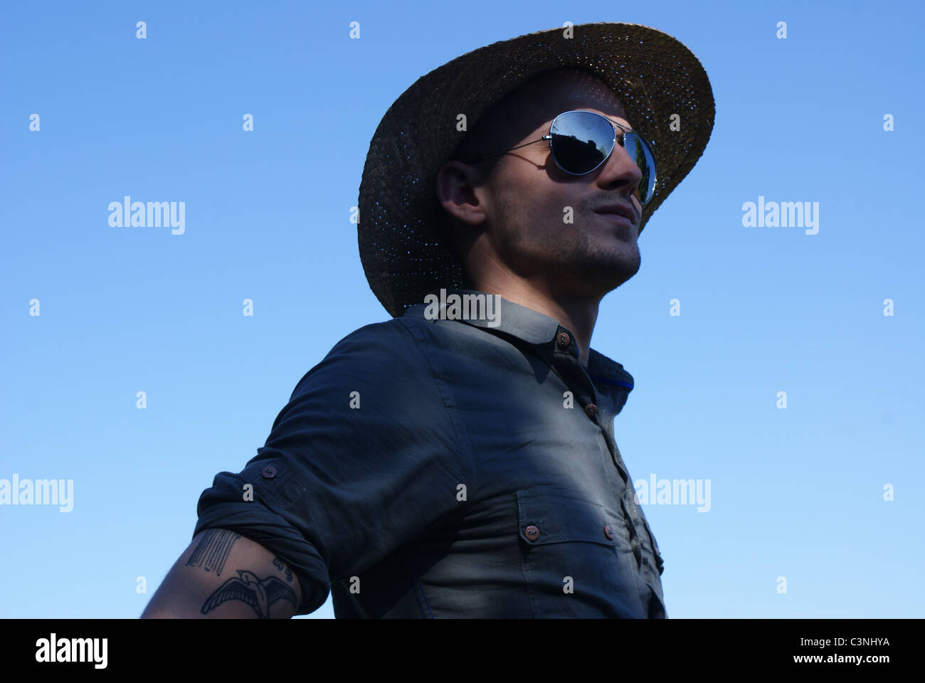 Man with hat and glasses hi-res stock photography and images - Alamy