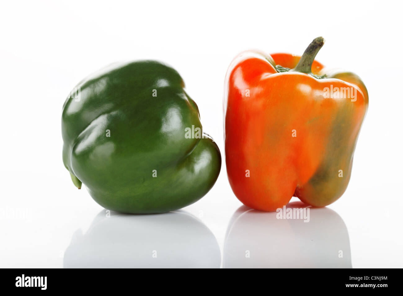Two peppers isolated on white background Stock Photo - Alamy