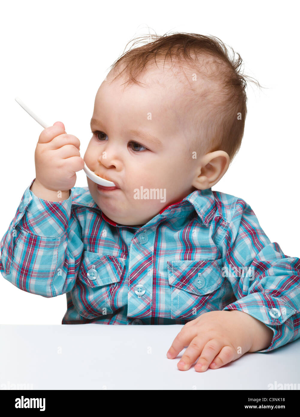 Biting Spoon High Resolution Stock Photography and Images - Alamy