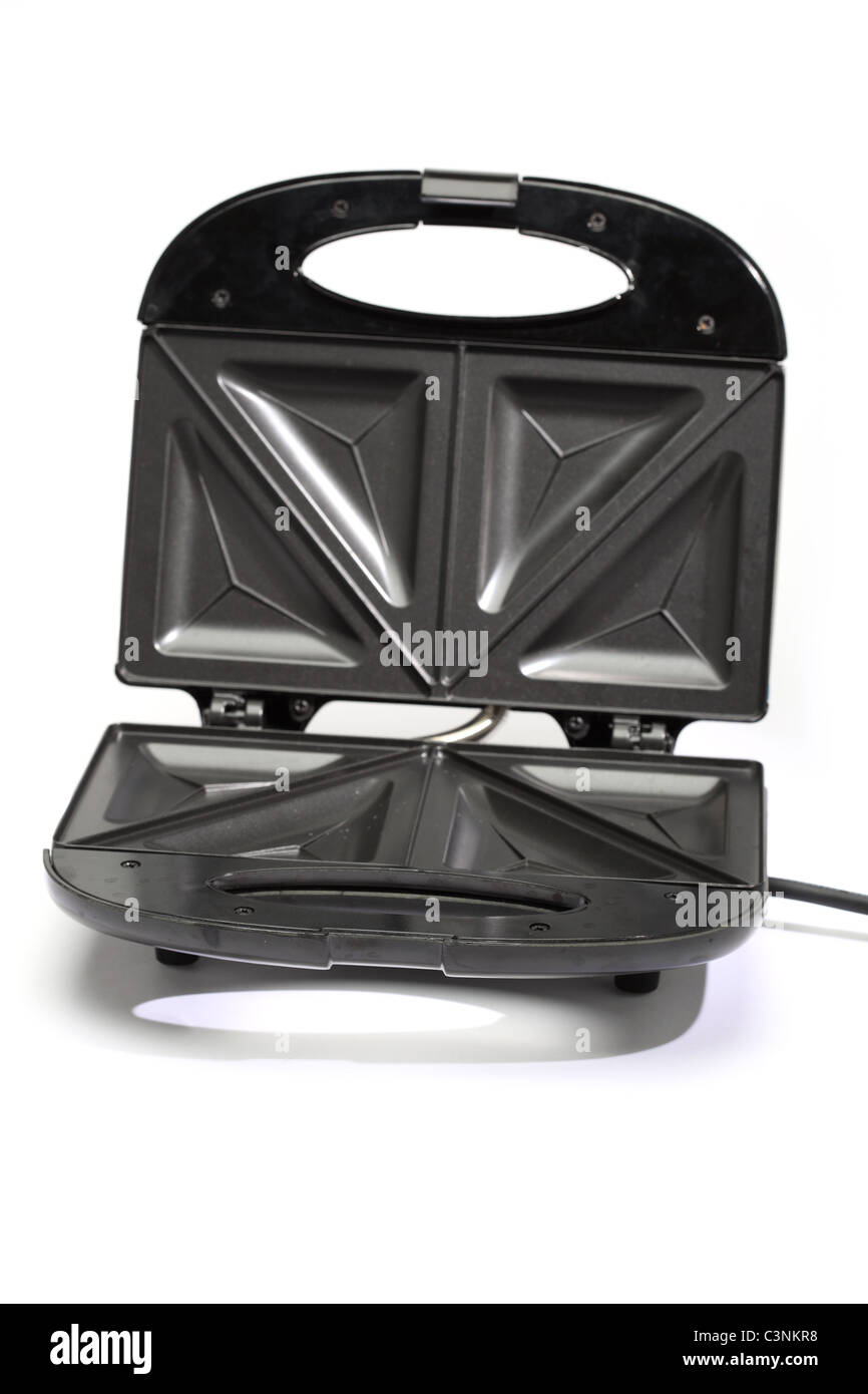 Grilled sandwich hand Cut Out Stock Images & Pictures - Alamy