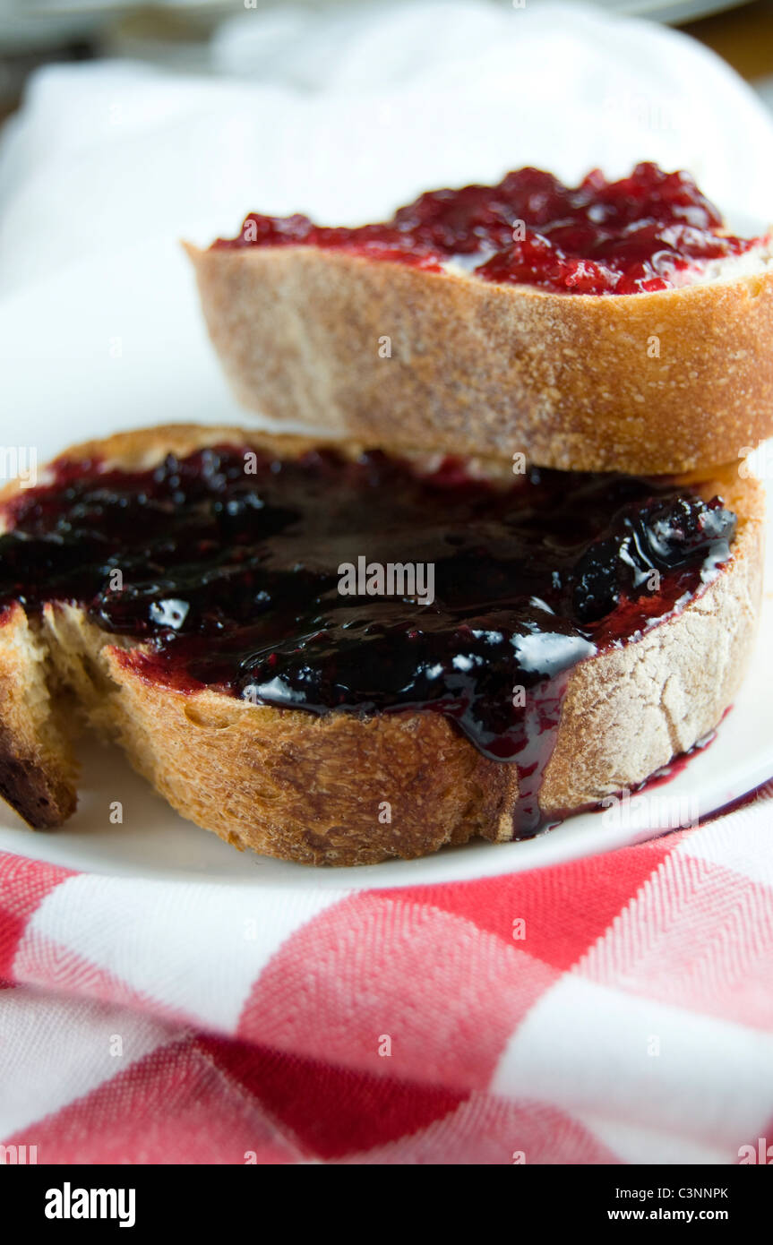 Toast with two kinds of jam Stock Photo - Alamy