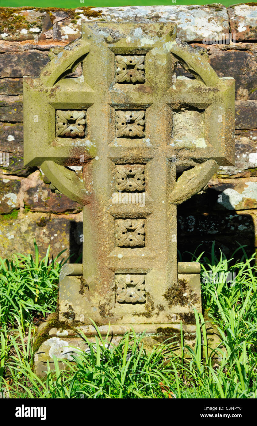 Gravestone with celtic cross and stylized floral design. All Saints ...