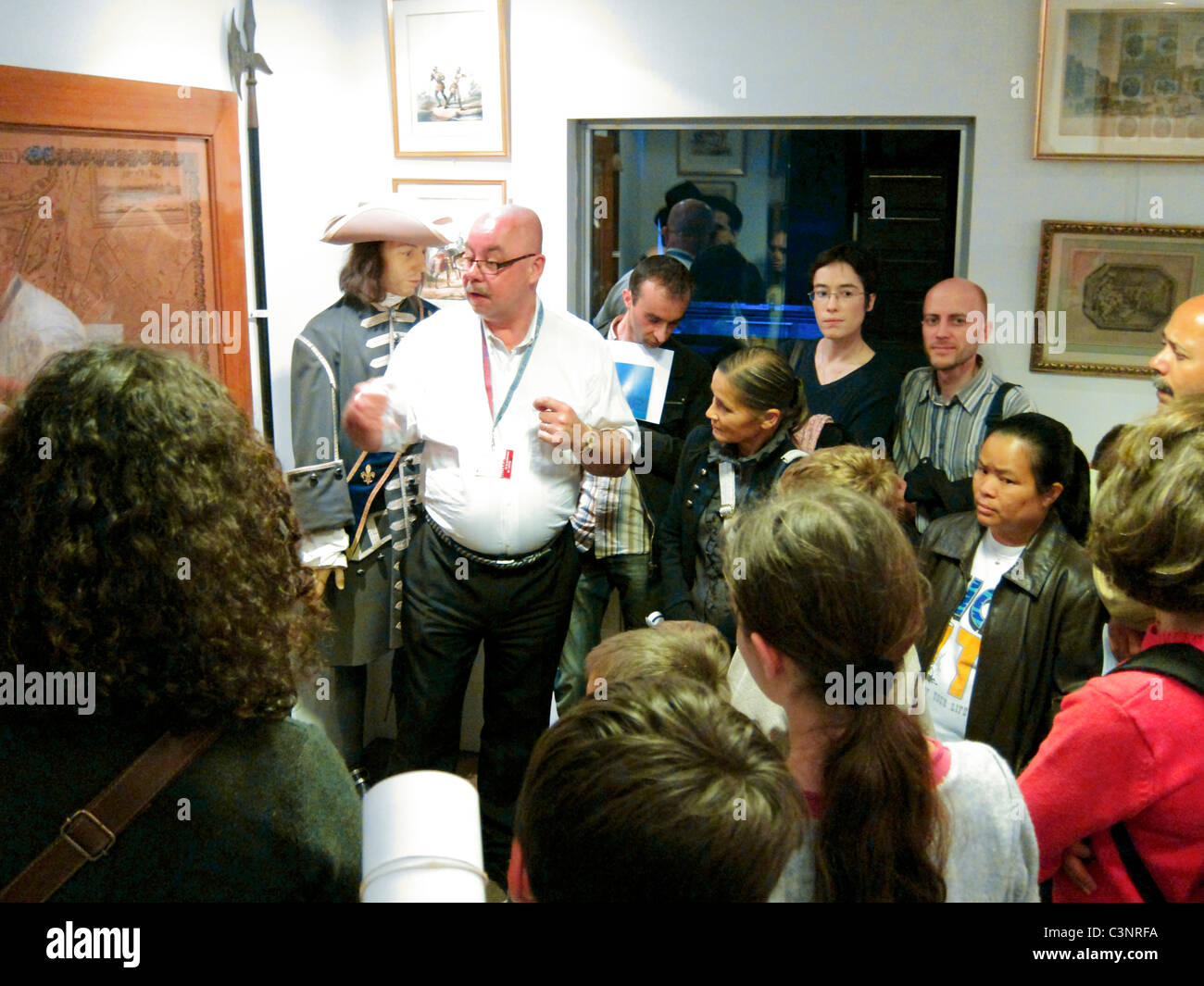 Paris, France, male Tour Guide leading groups Talking to Crowd of ...