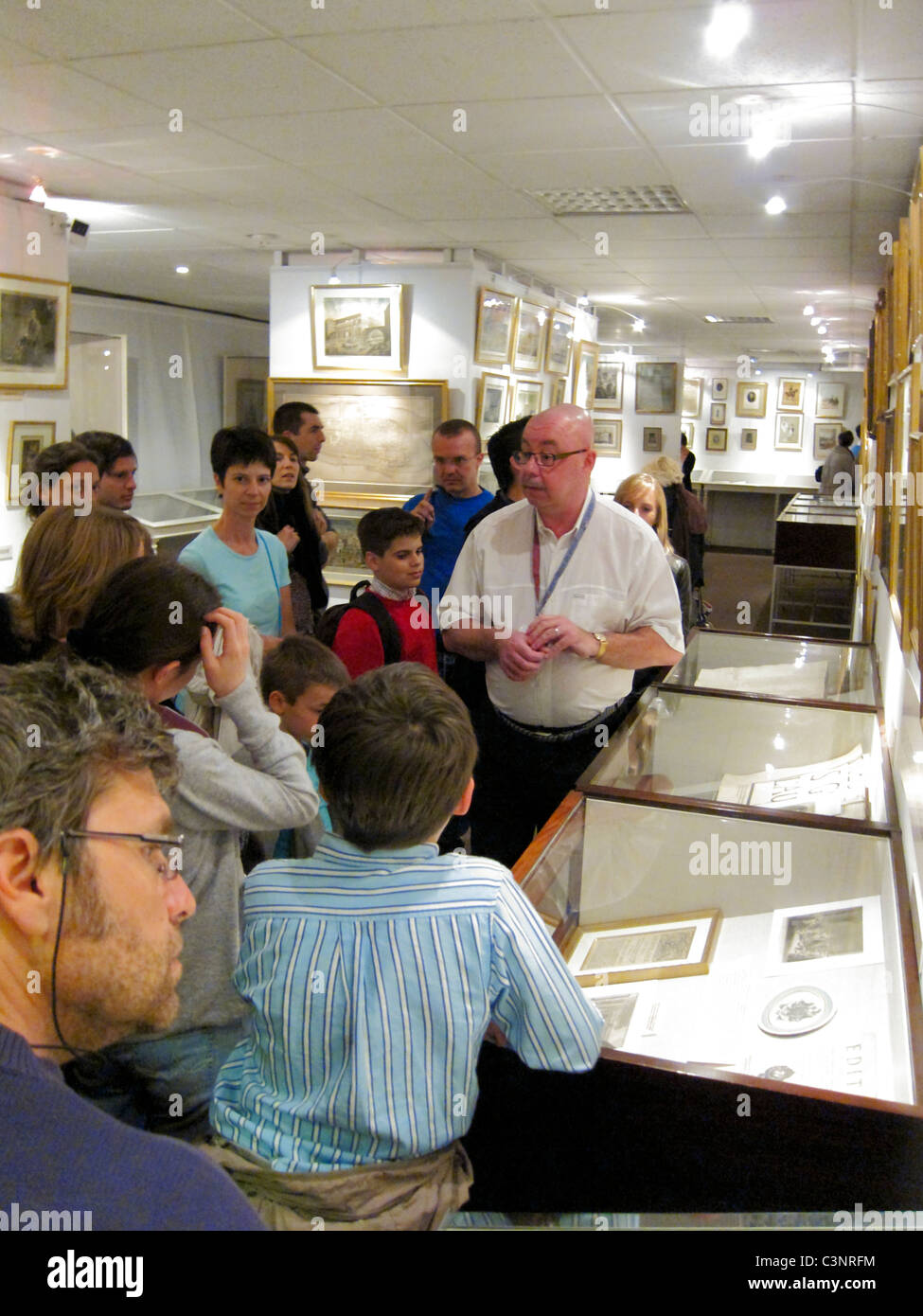 Paris, France, male Tour Guide leading groups Talking to People ...