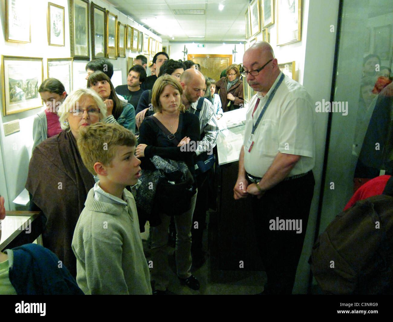 Paris, France, male Tour Guide leading groups Talking to People ...