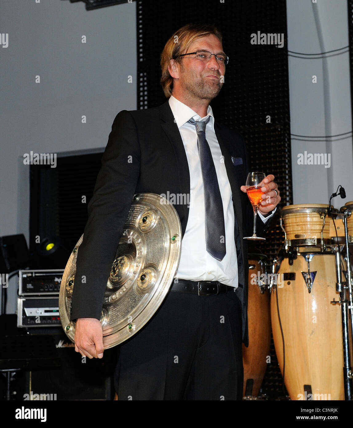 Juergen Klopp, coach of German Bundesliga club Borussia Dortmund holds ...
