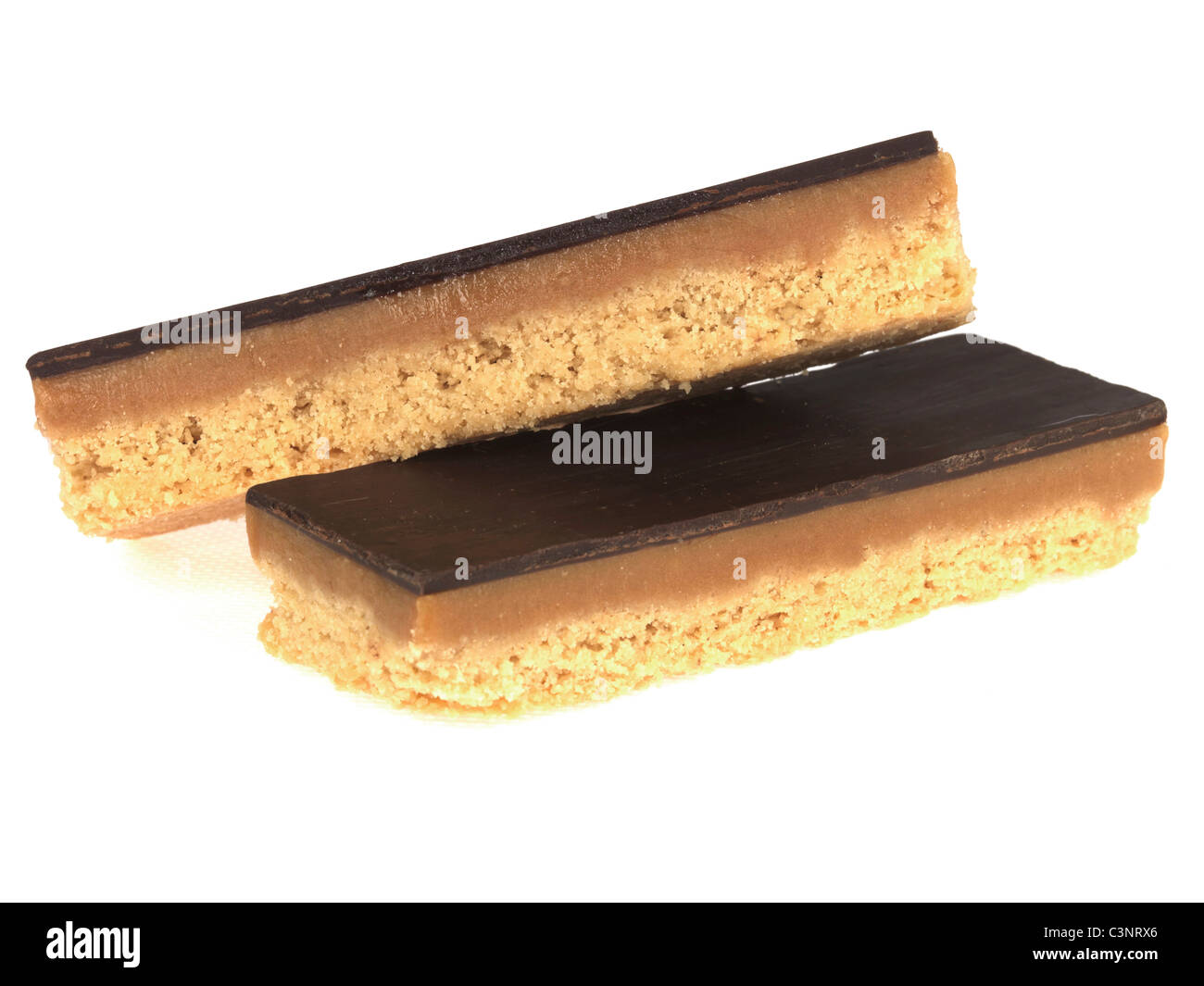Luxury Baked Millionaire Chocolate and Caramel Shortbread Slice Against ...