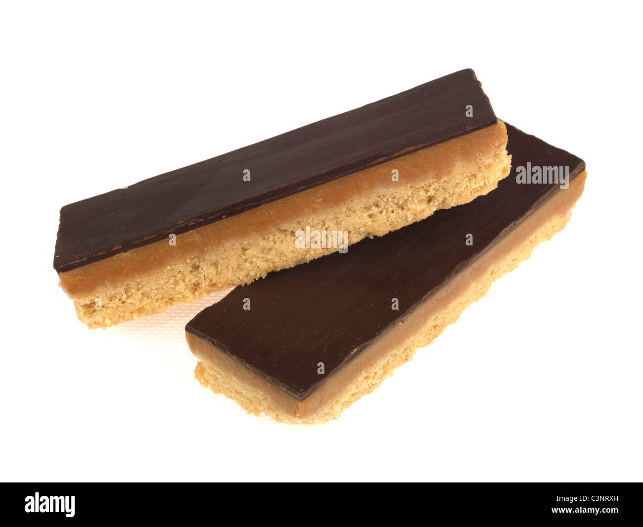 Luxury Baked Millionaire Chocolate and Caramel Shortbread Slice Against ...