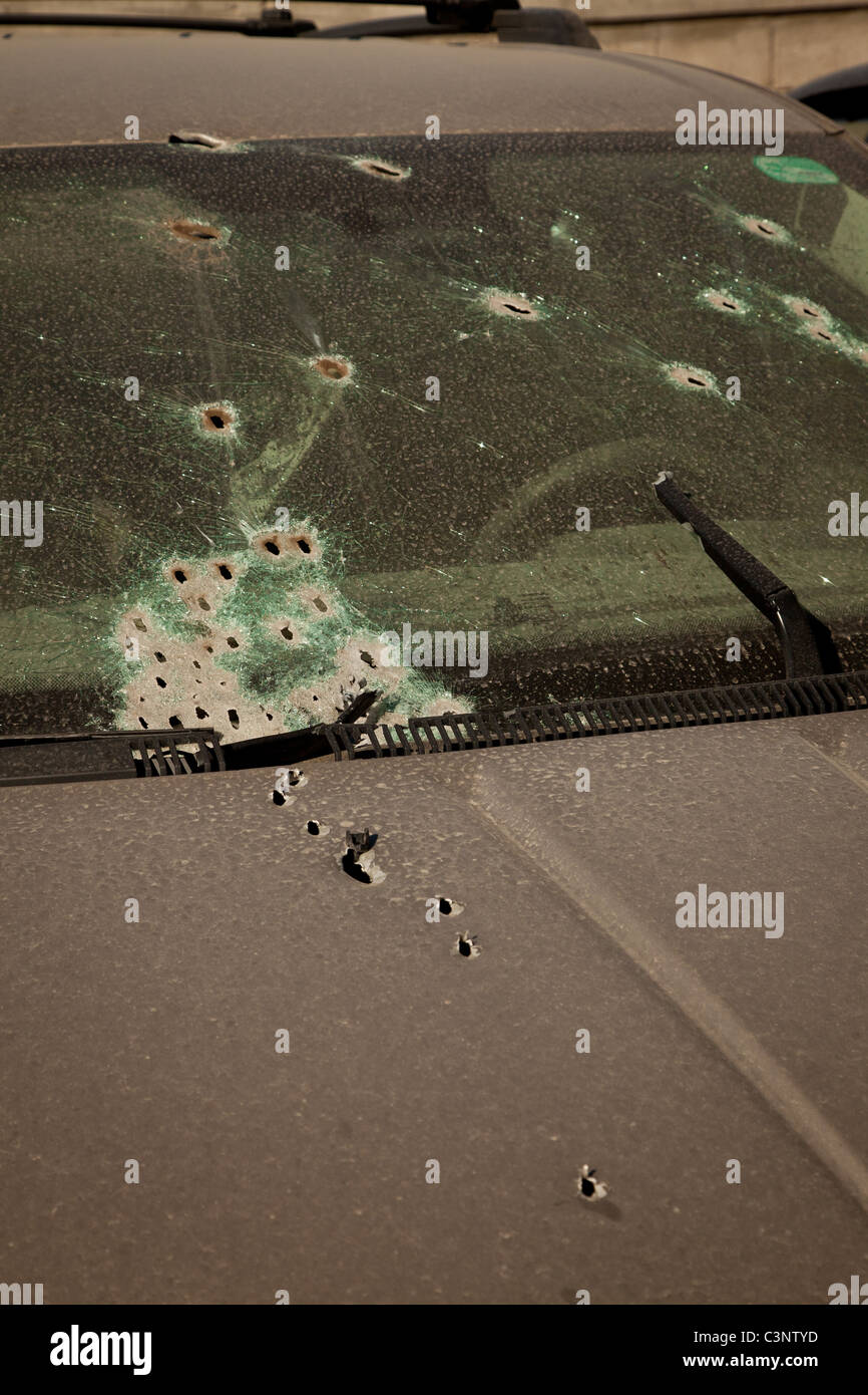 A bullet splattered windshield on a vehicle held for evidence from a ...