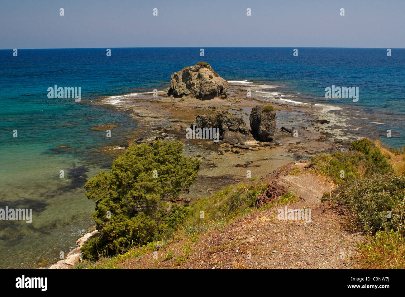 The wild, rugged and empty coastline between Latsi and the Baths of ...