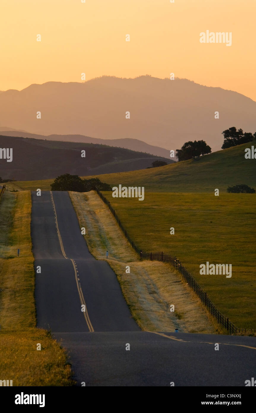 Country road through rolling hills hi-res stock photography and images ...