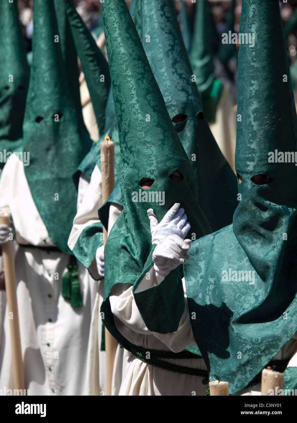 Nazarenos parading during Semana Santa in Malaga, Spain, April 2011 ...