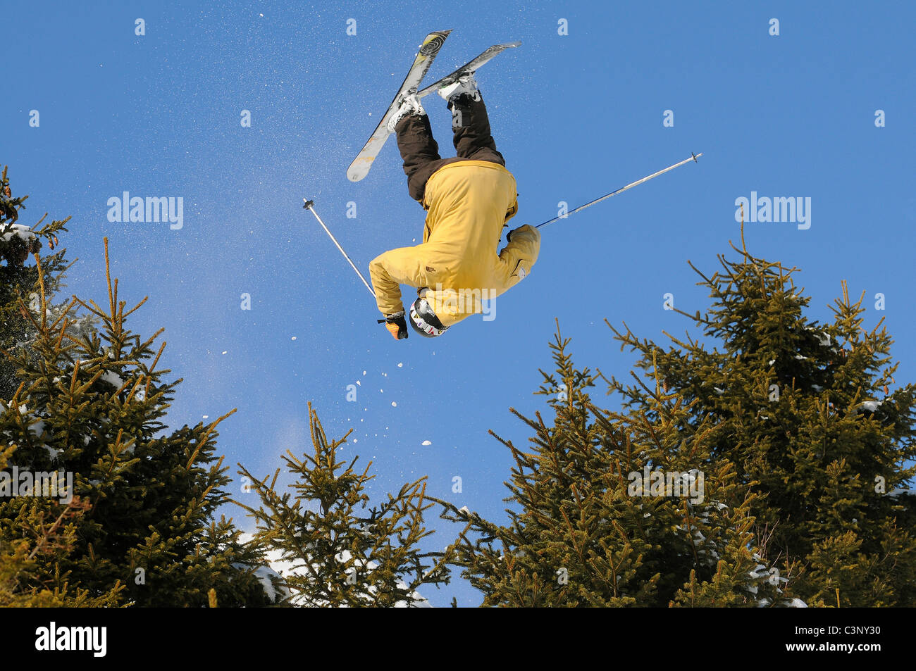 A skier performs a front flip off a huge jump in the ski resort of ...