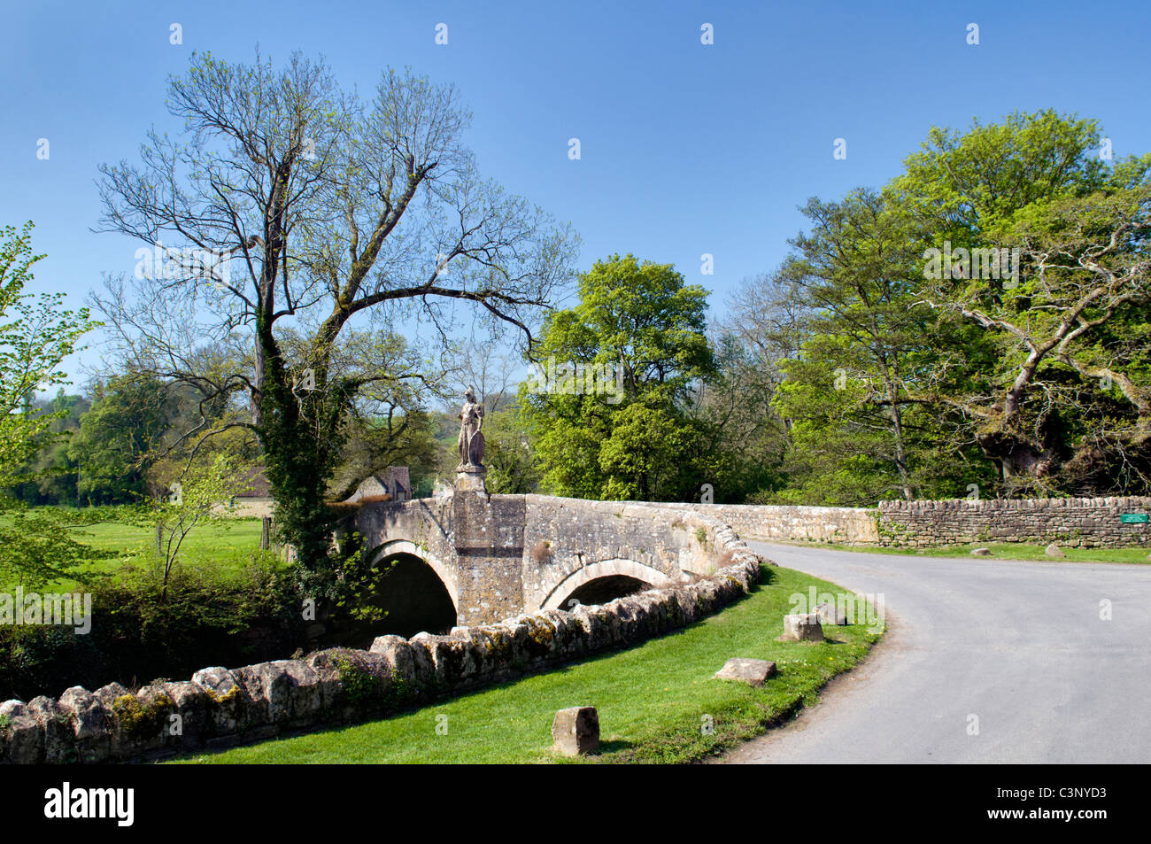 Pretty road bridge and single track road at Iford, Bradford on Avon ...