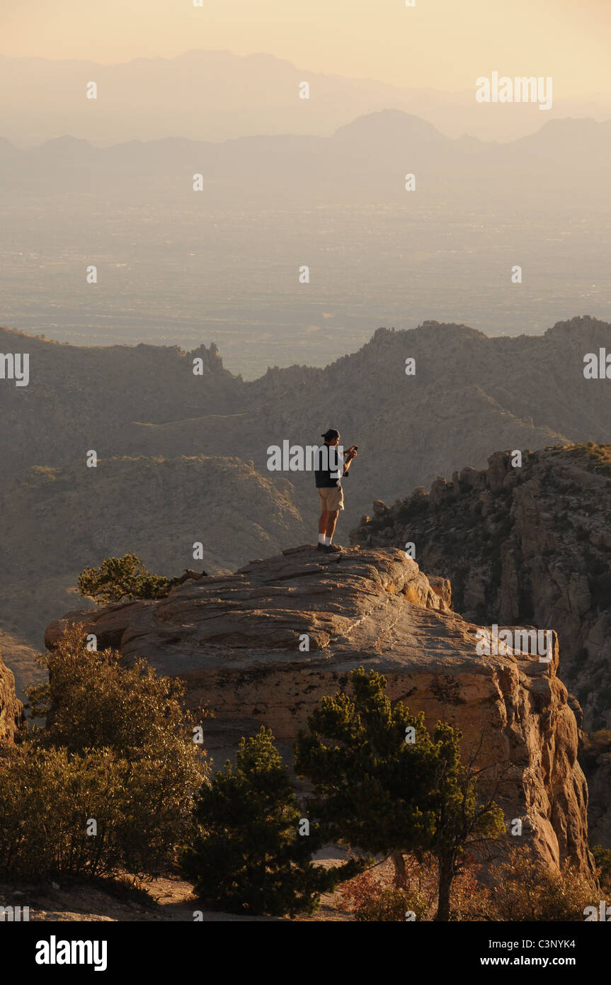 A tourist at Windy Point Vista, Mount Lemmon, in the Santa Catalina ...