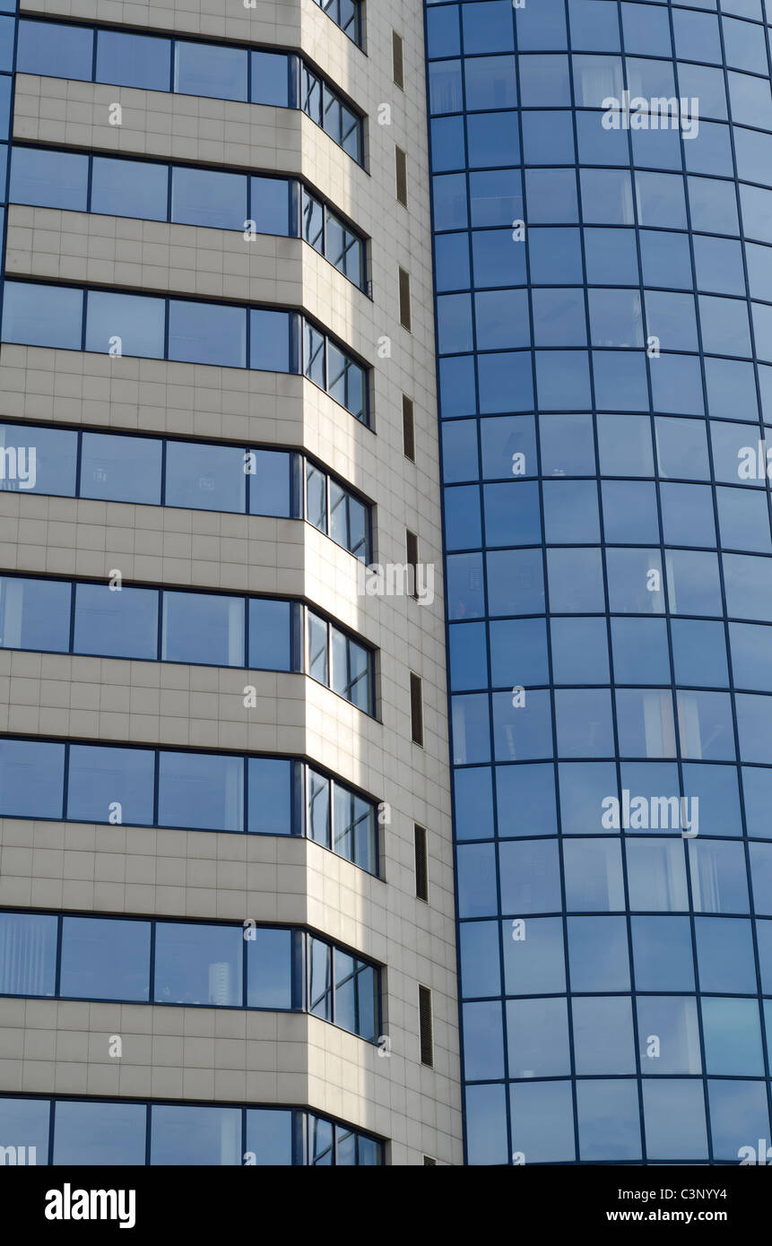 Reflective windows in office block Stock Photo - Alamy