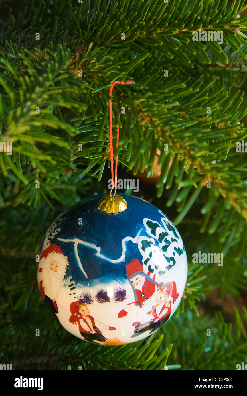 Norwegian motif glass bauble on real Christmas tree branch Stock Photo ...