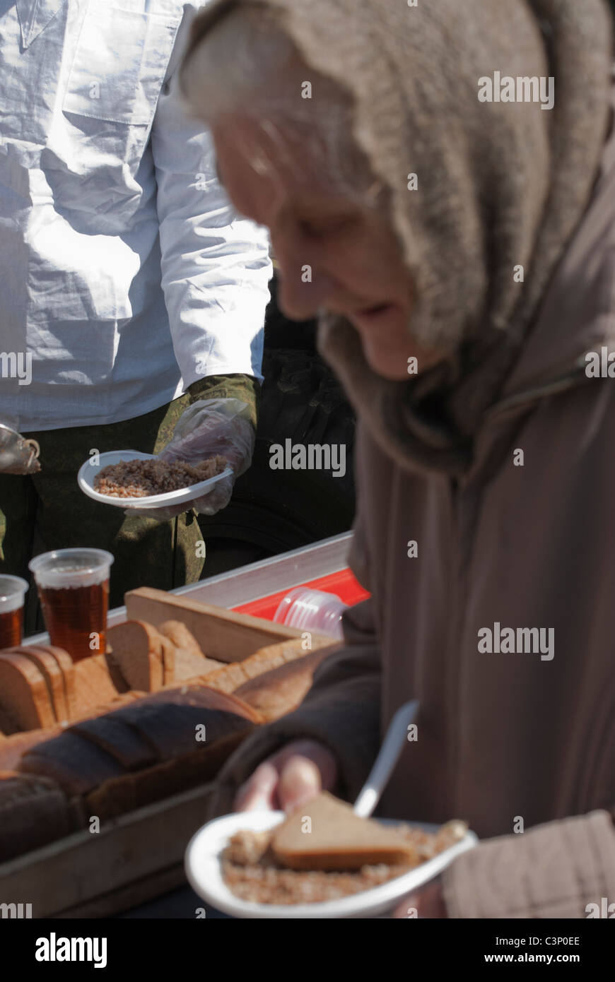 A Russian army cook give the army food during a celebration of Victory ...