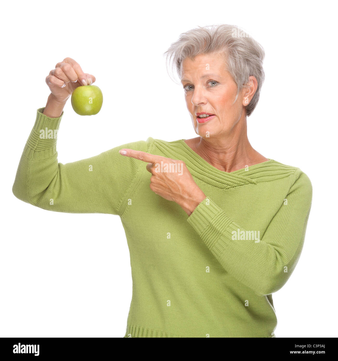 Full isolated portrait of a active senior with apple Stock Photo - Alamy
