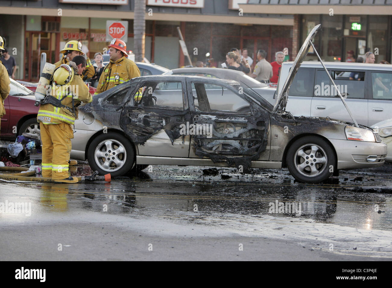 A car bursts into flames in the parking lot of a Trader Joe's grocery ...