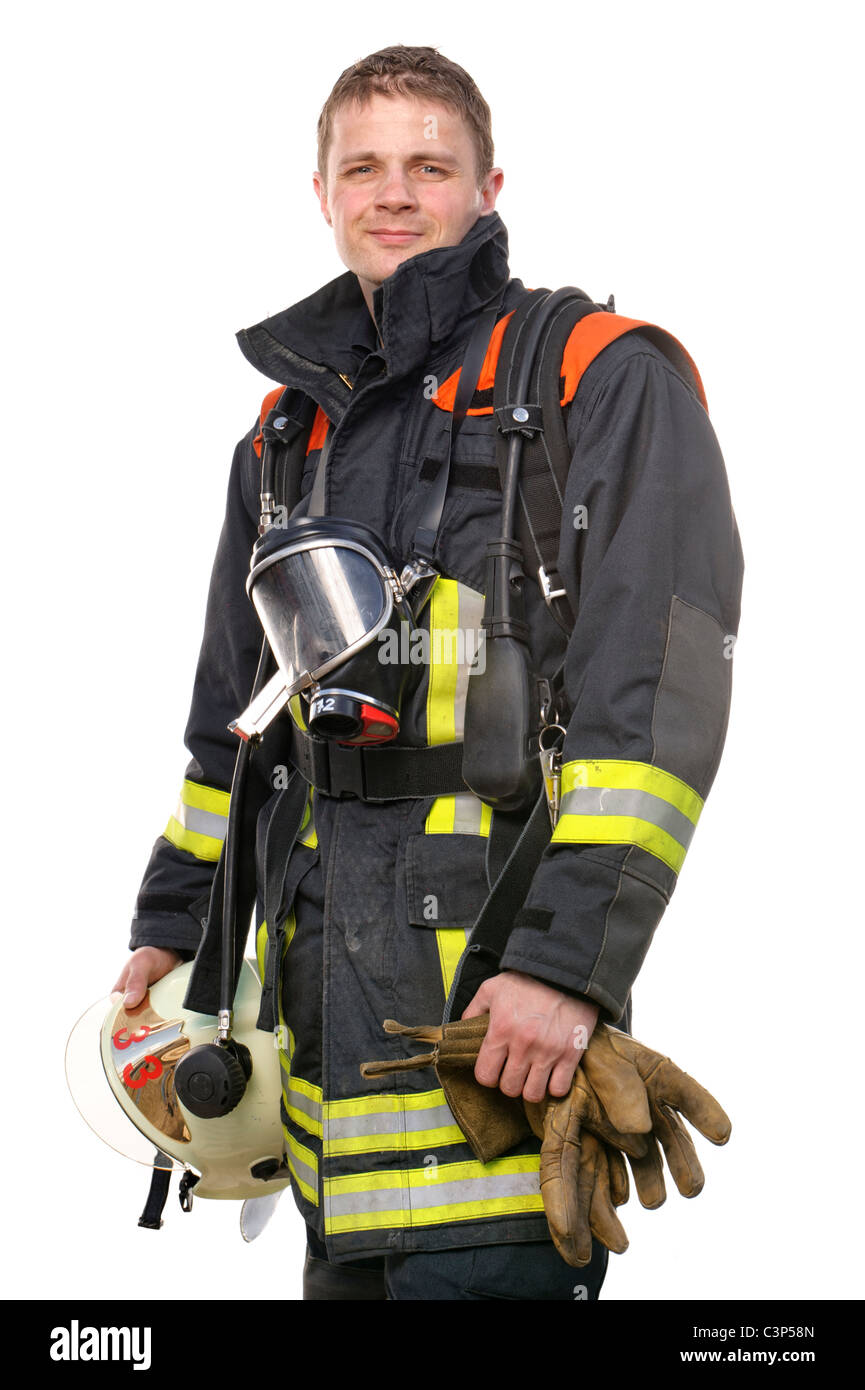 Picture from a young and successful firefighter at work Stock Photo - Alamy