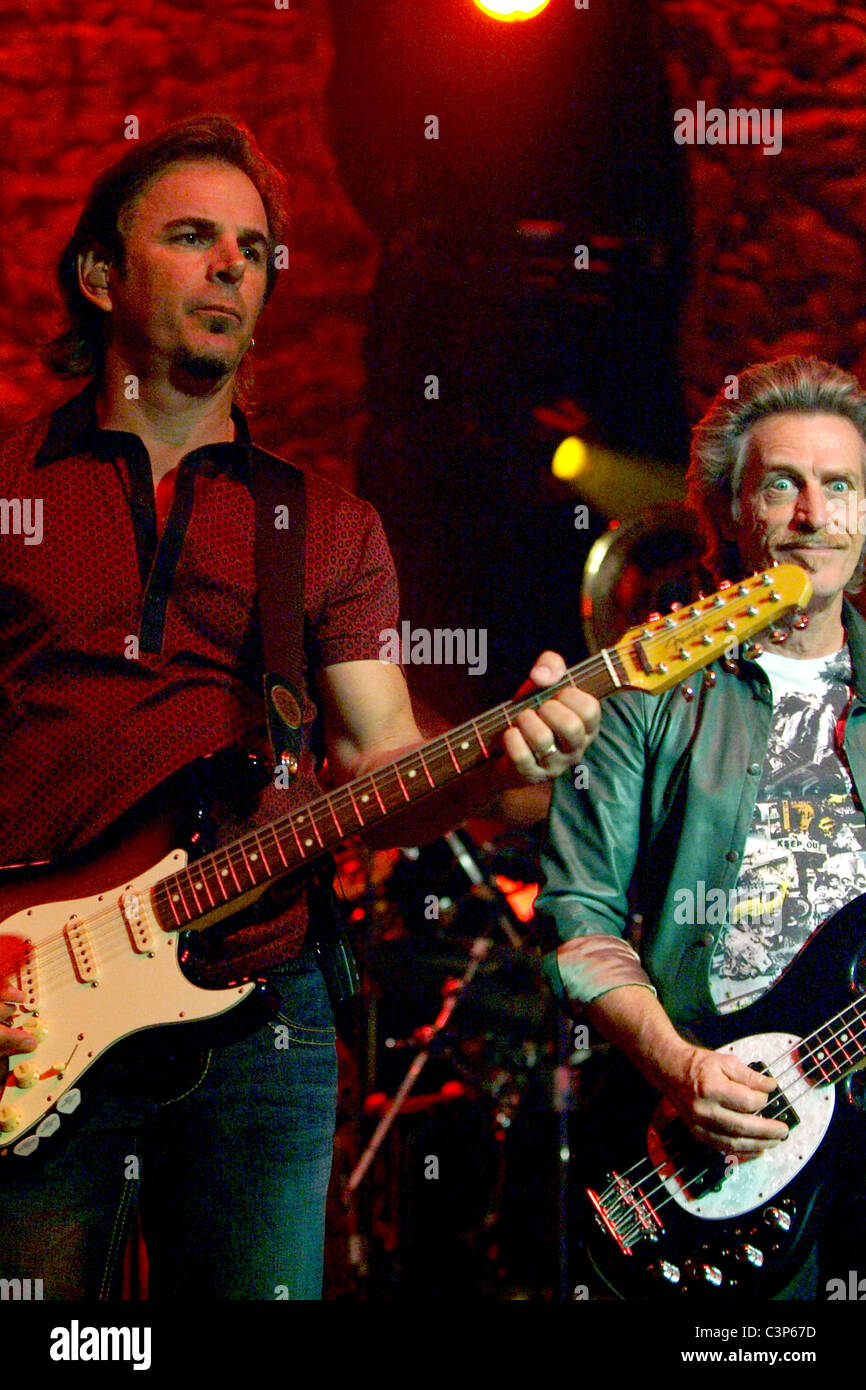 Keyboard Jonathan Cain and Bassist Ross Valory performs with the band ...