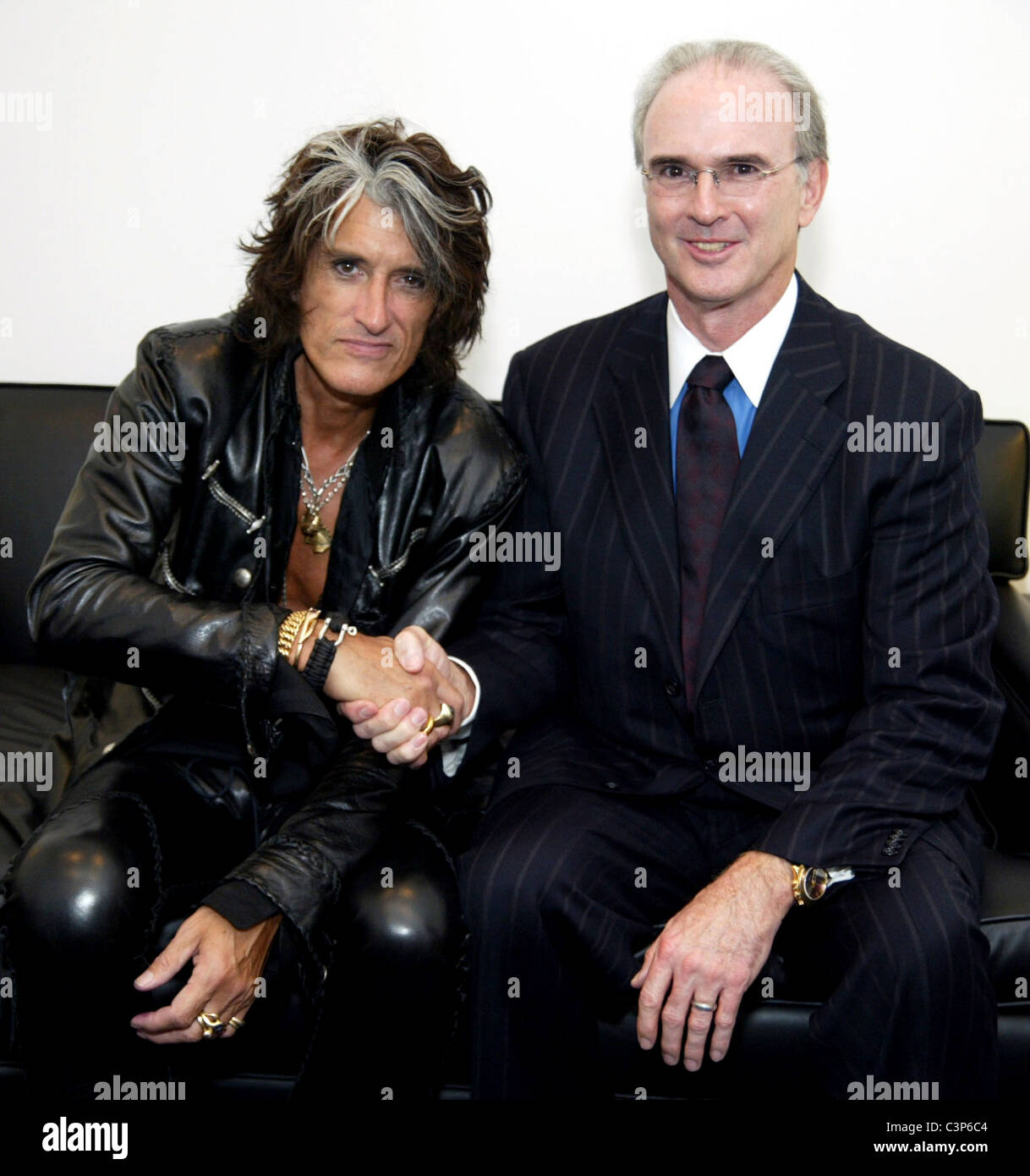 Joe Perry, co-founder of Aerosmith, meets with Tom Hutton, Trustee ...