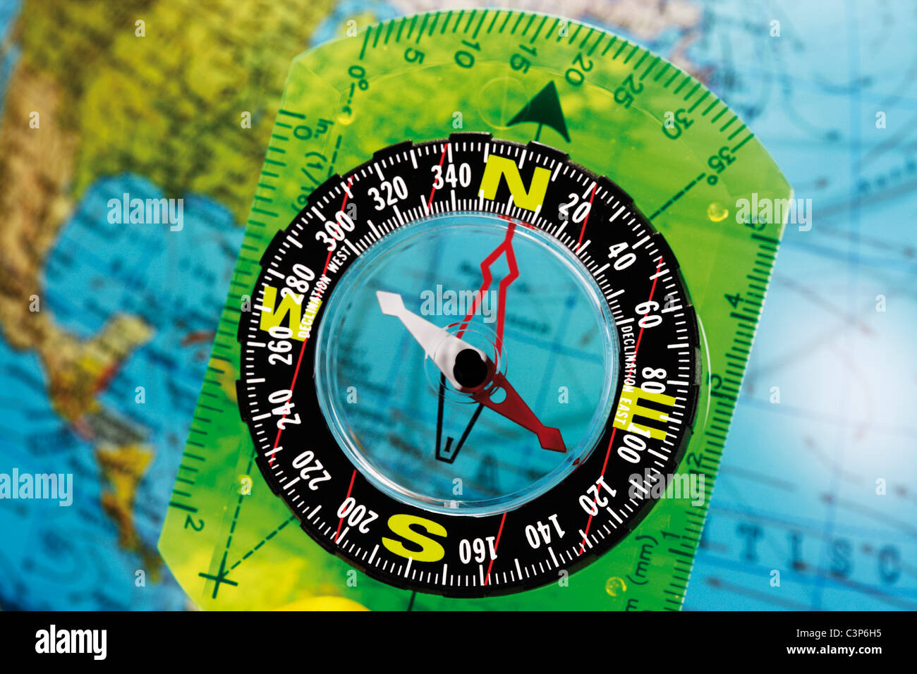 Compass and globe, close-up Stock Photo - Alamy