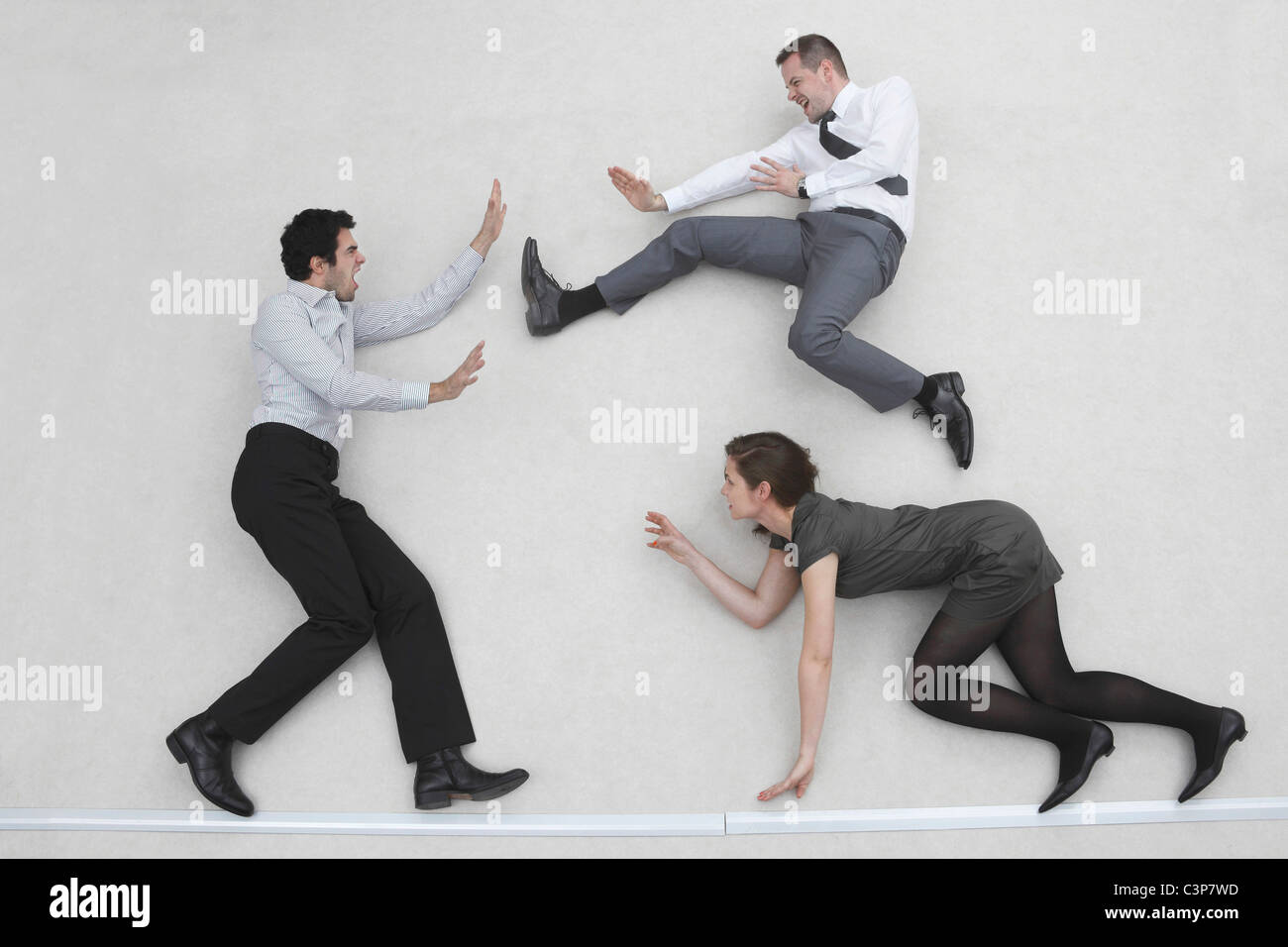 Three Business People Fighting High Resolution Stock Photography and ...