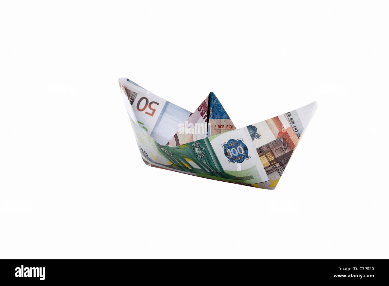 Origami paper boat of euro notes on white background Stock Photo - Alamy