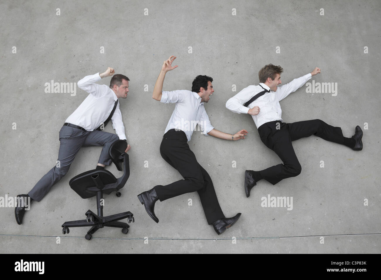 Three businessmen cheering hi-res stock photography and images - Alamy